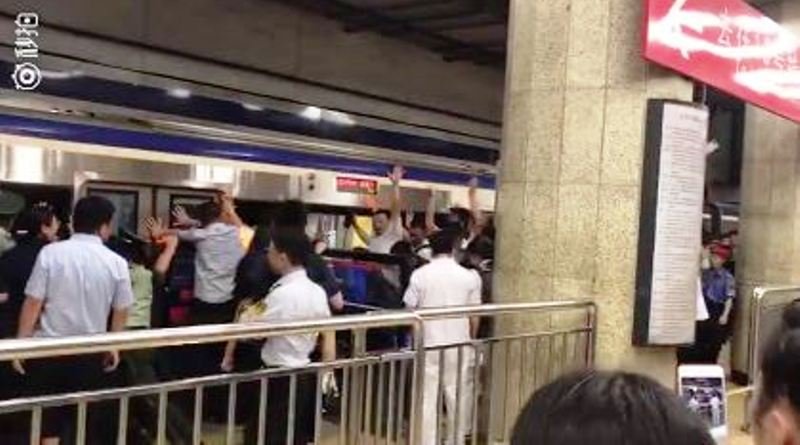 Beijing Commuters Rescue Trapped Man By Pushing Subway Train Off Him